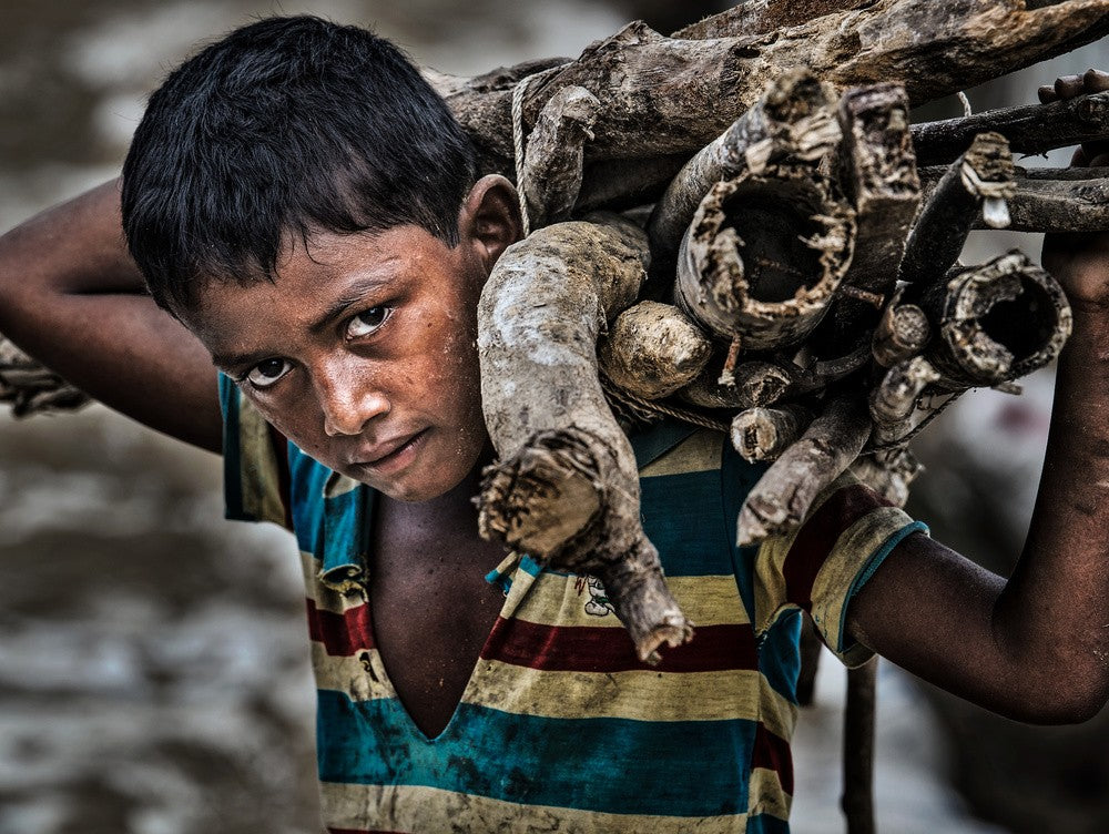 Rohingya refugee boy carrying some firewood. Art Print by Joxe Inazio ...