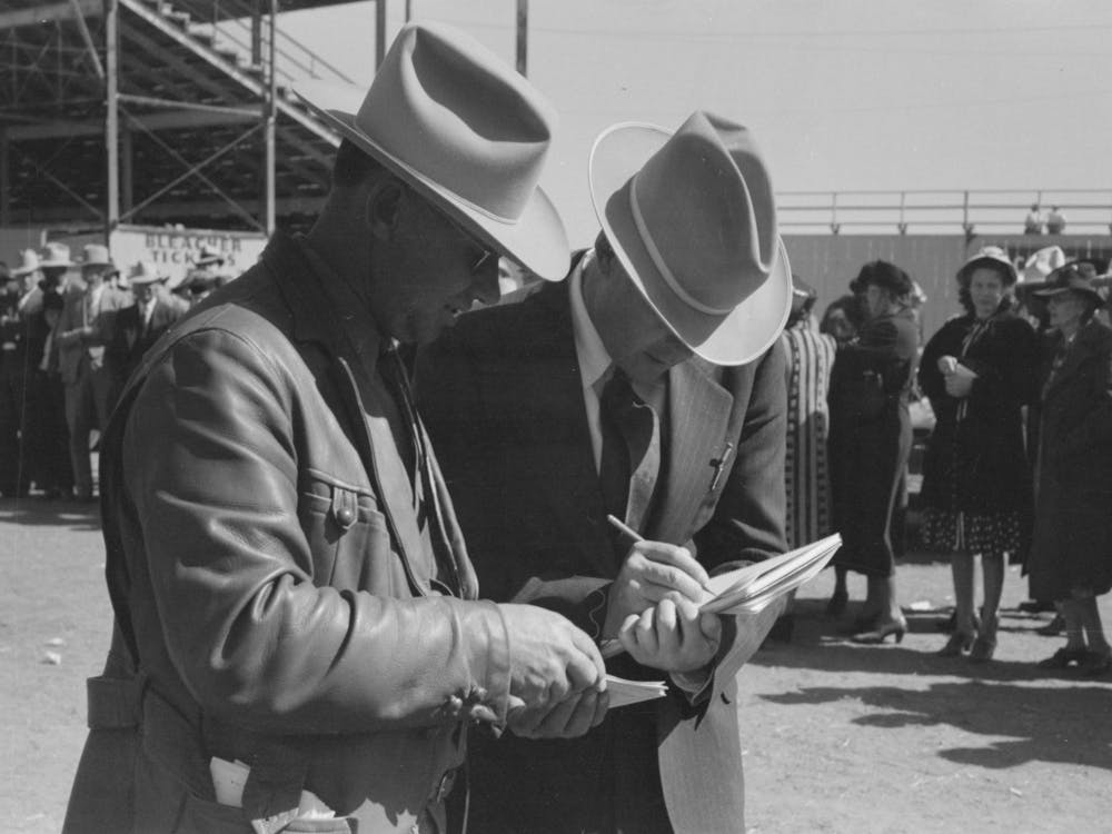 Judges Of Horses Checking The Entries At The San Angelo Fat Stock Show ...