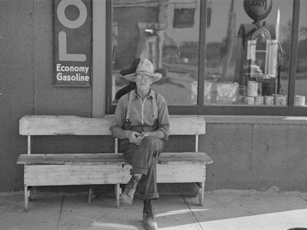 Man Sitting In Front Of Store, Craigville, Minnesota By Russell Lee Art ...