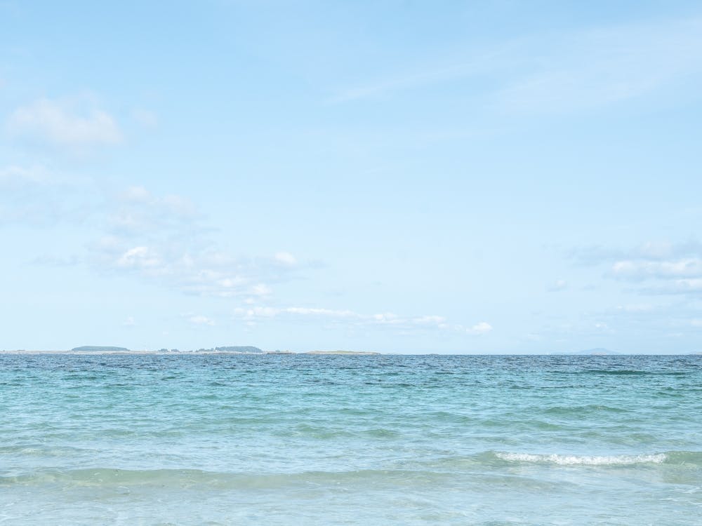 Turqoise blue ocean at Olberg beach in Norway - Jaerre coast summer ...