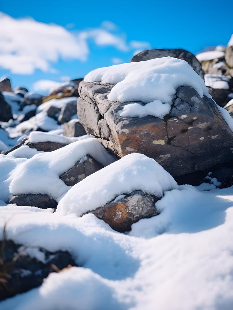 Snow Covered Stones in the Mountains Art Print by drdigitaldesign – Fy!