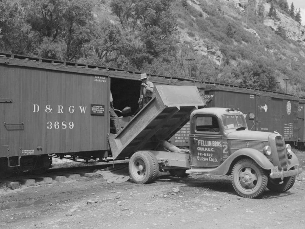 Loading Gold Ore Concentrate Into Freight Cars Of Narrow Gauge Railroad ...